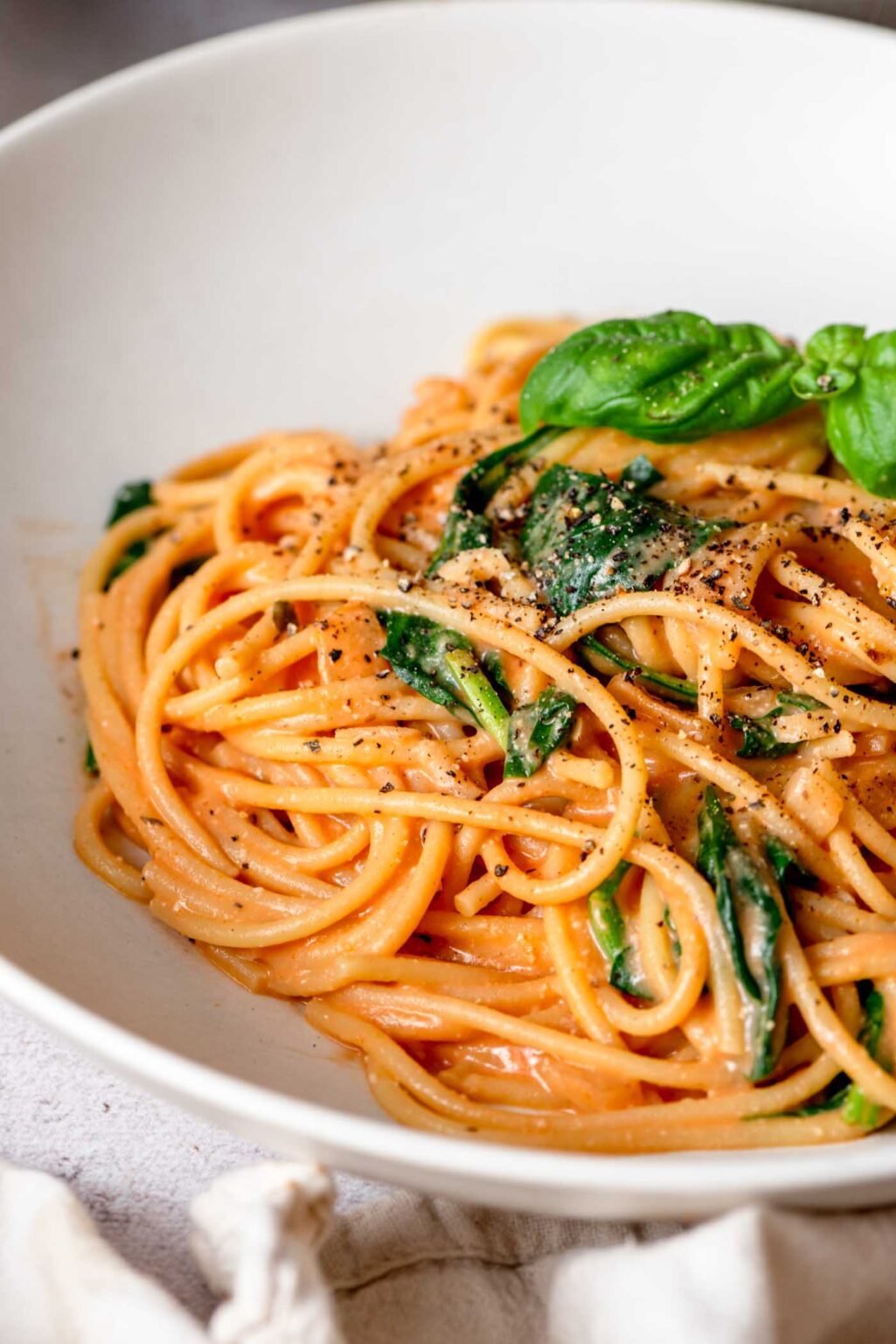 Creamy Spinach and Tomato Pasta - Running on Real Food